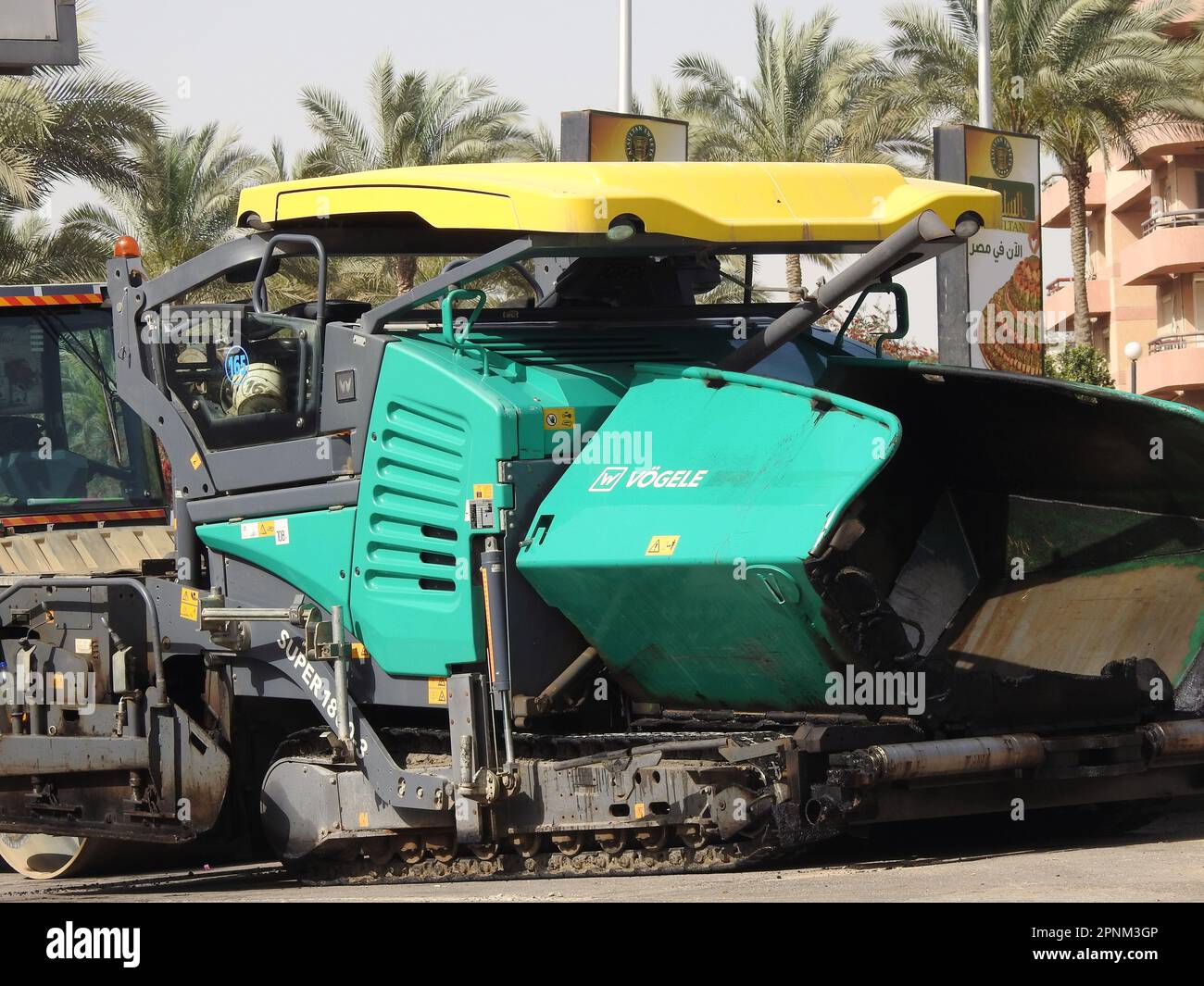 Cairo, Egypt, April 18 2023: Track asphalt paver truck, A paver (road ...