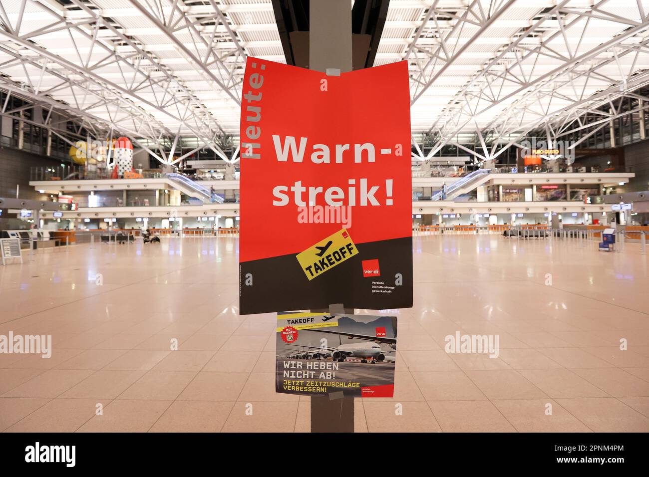 Hamburg, Germany. 19th Apr, 2023. A poster reading "Warning strike ...