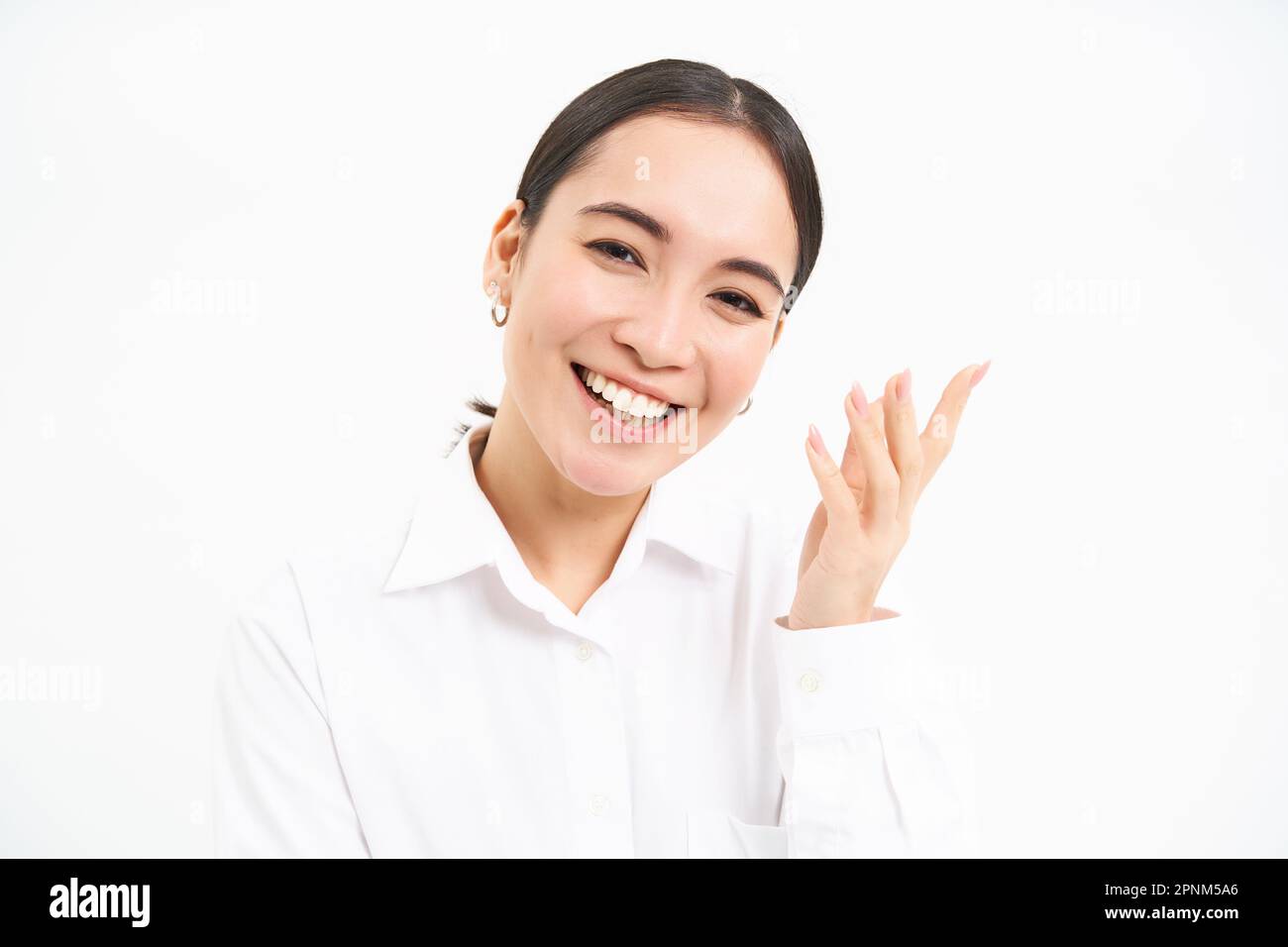 Beautiful young korean woman, laughing and smiling, showing sincere ...