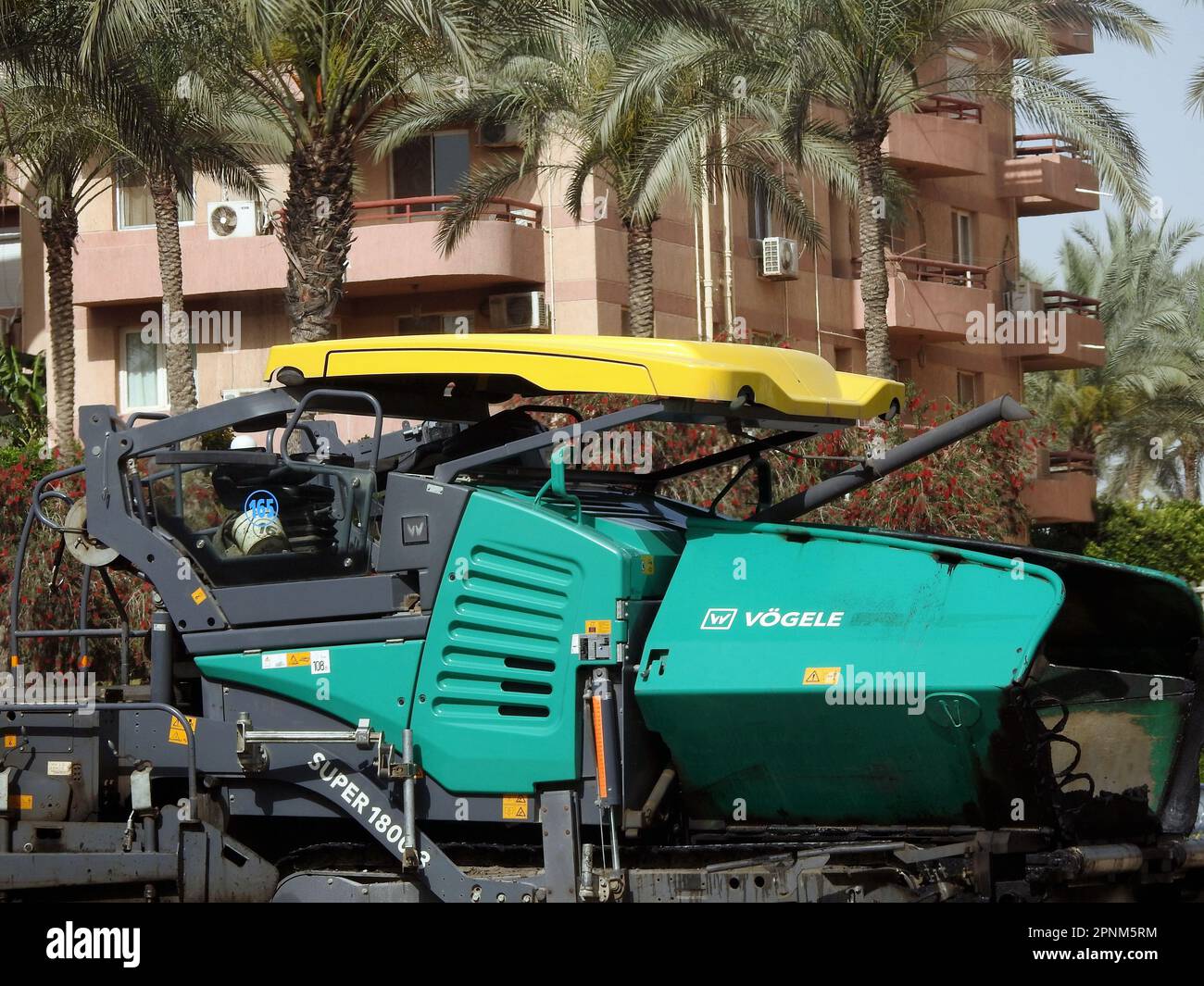 Cairo, Egypt, April 18 2023: Track asphalt paver truck, A paver (road ...