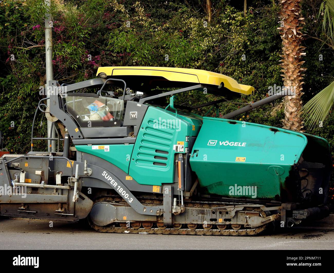Cairo, Egypt, April 7 2023: Track asphalt paver truck, A paver (road ...