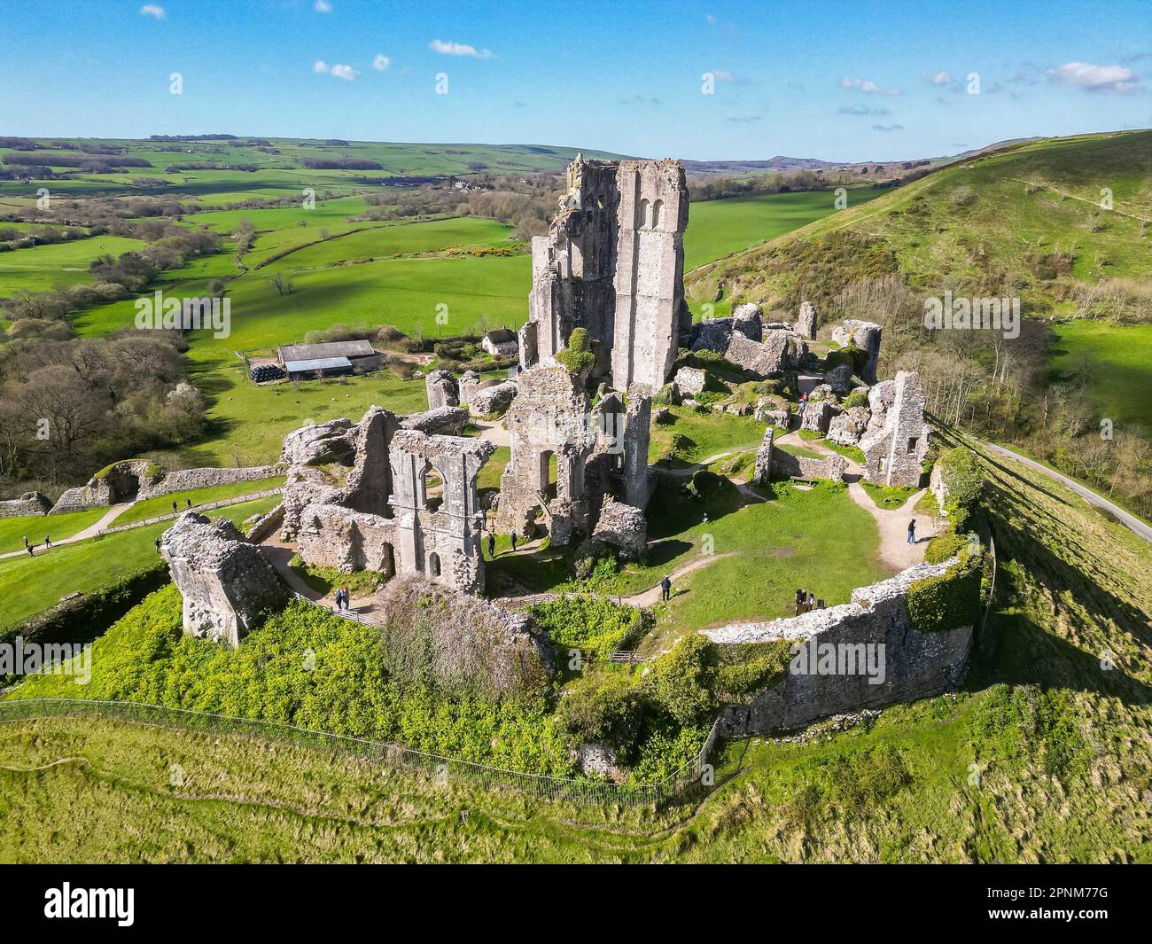 Aerial view of the ruins of Corfe Castle in the Isle of Purbeck in ...