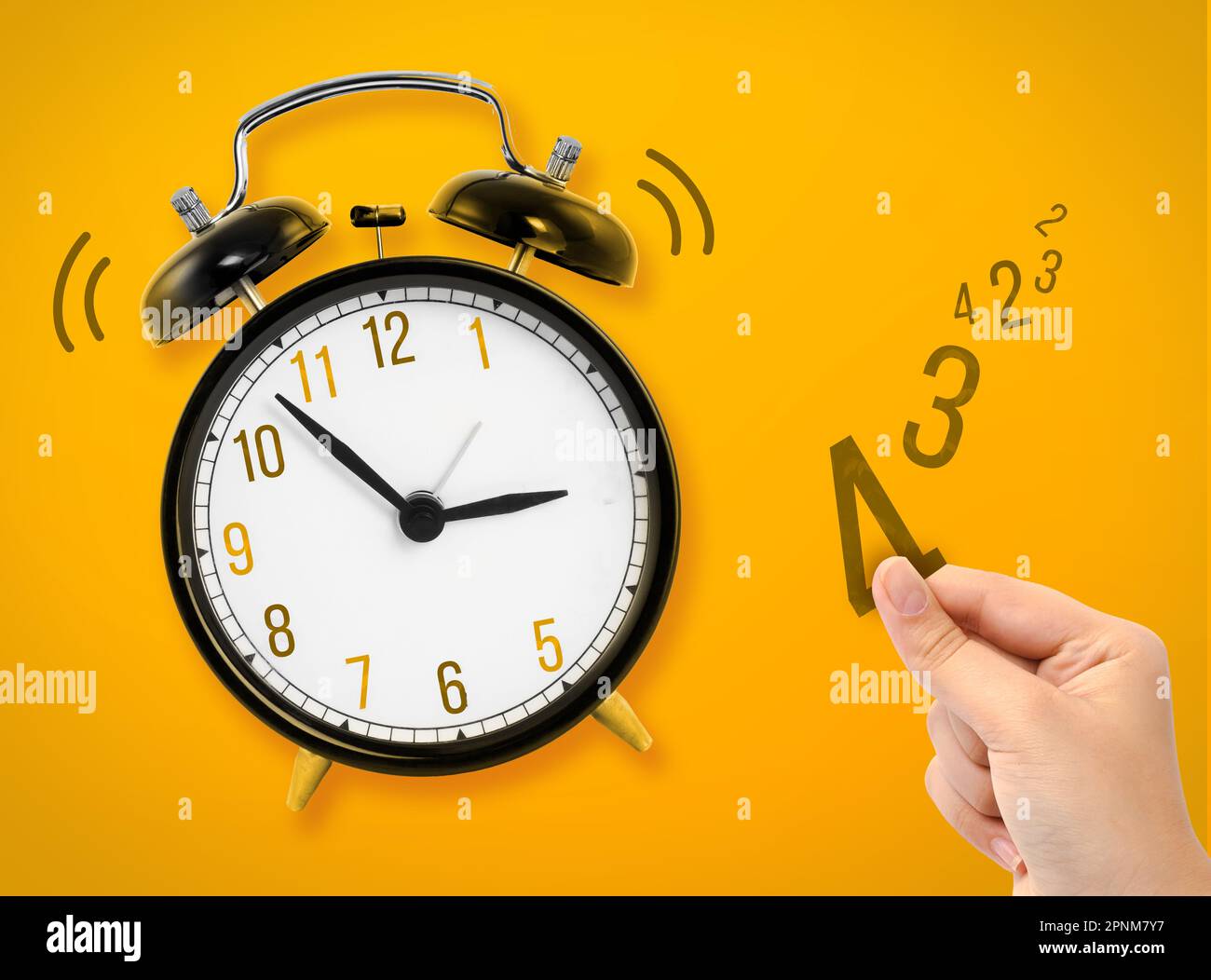 Hand holding numbers flying from clock. time flies concept Stock Photo ...