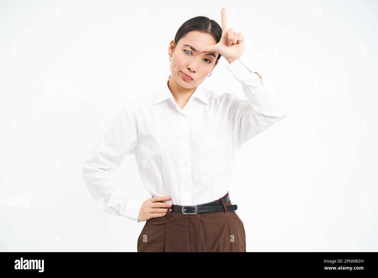 Successful businesswoman looks confident, shows L letter, loser sign on ...