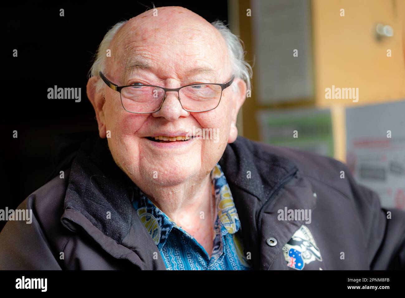Iconic and beloved Melbourne Priest, Father Bob Maguire stands in front ...