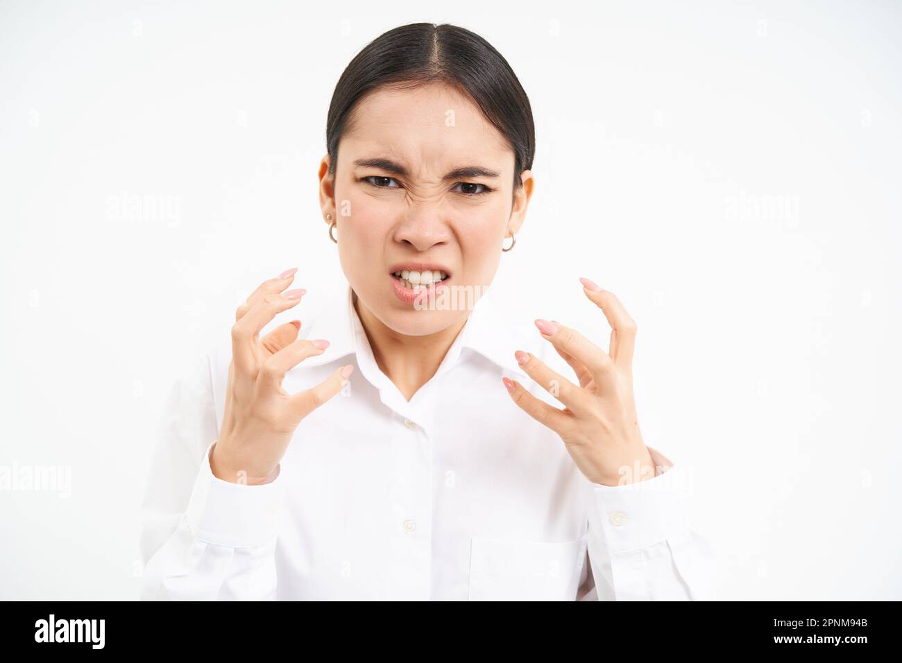 Angry office lady, asian businesswoman screams and clenches fists from ...