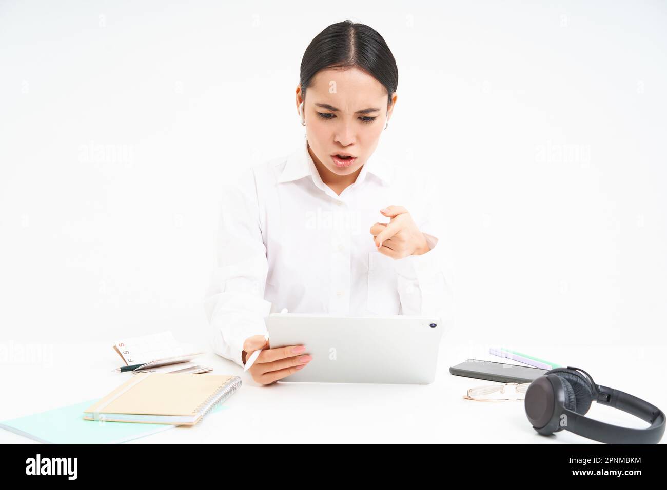 Angry korean woman shouting at employee on video chat, has intense ...