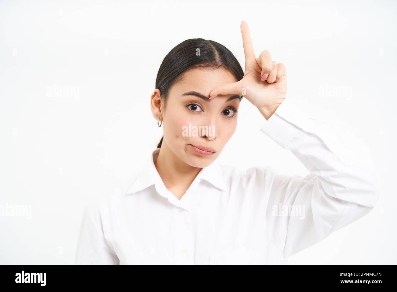 Failure. Close up portrait of korean business woman shows L letter ...