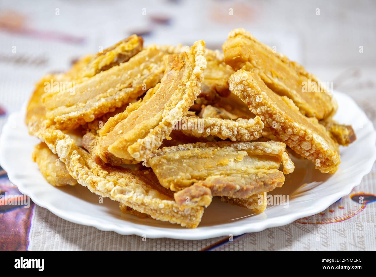 Crispy pork rinds hi-res stock photography and images - Alamy
