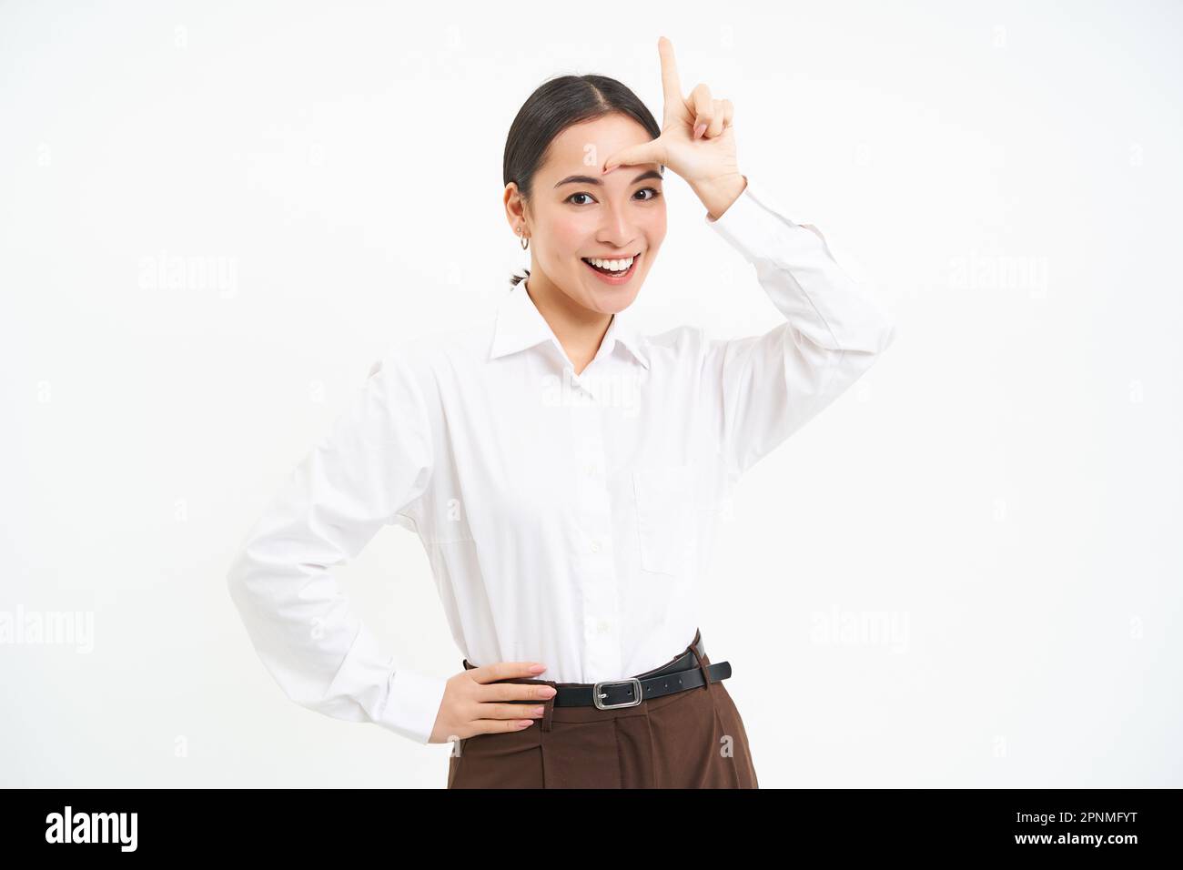 Successful businesswoman looks confident, shows L letter, loser sign on ...