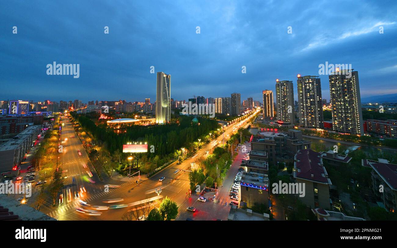 KORLA, CHINA - APRIL 19, 2023 - Night view of Korla city after rain in ...