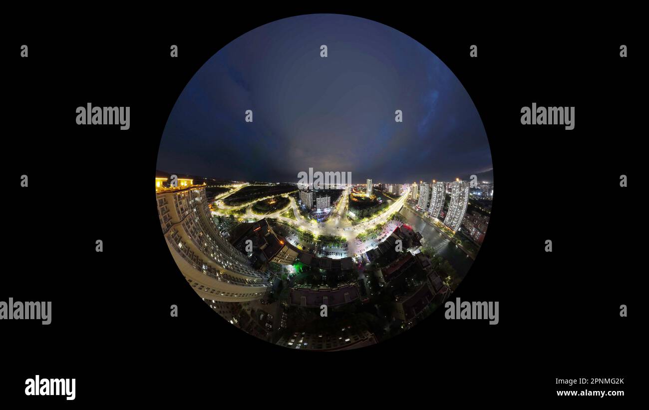 KORLA, CHINA - APRIL 19, 2023 - Night view of Korla city after rain in ...