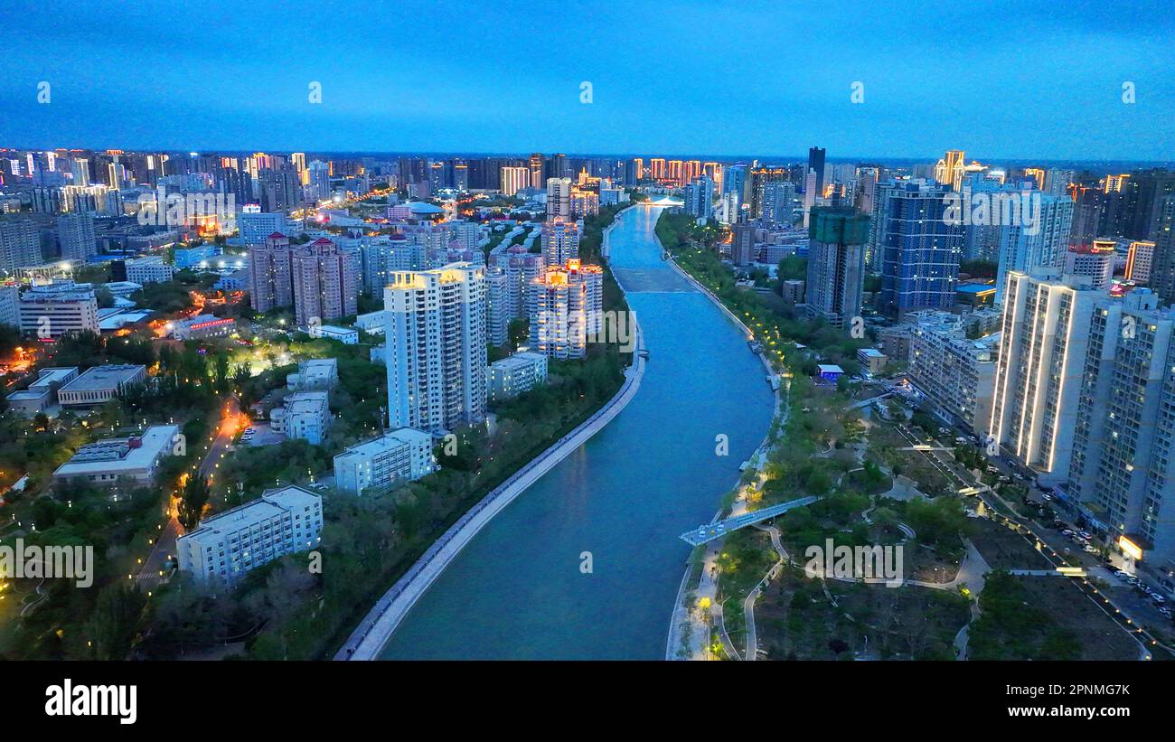 KORLA, CHINA - APRIL 19, 2023 - Night view of Korla city after rain in ...