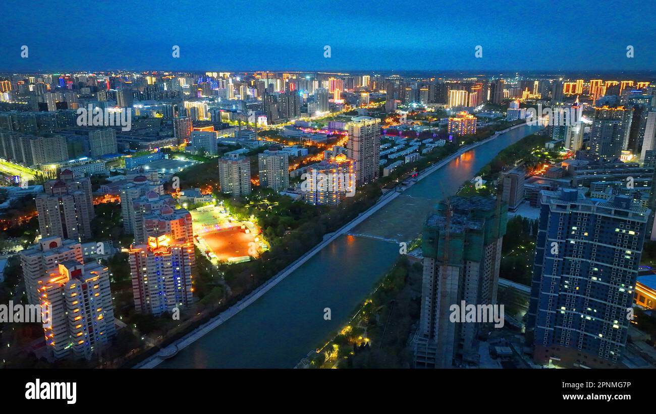 KORLA, CHINA - APRIL 19, 2023 - Night view of Korla city after rain in ...