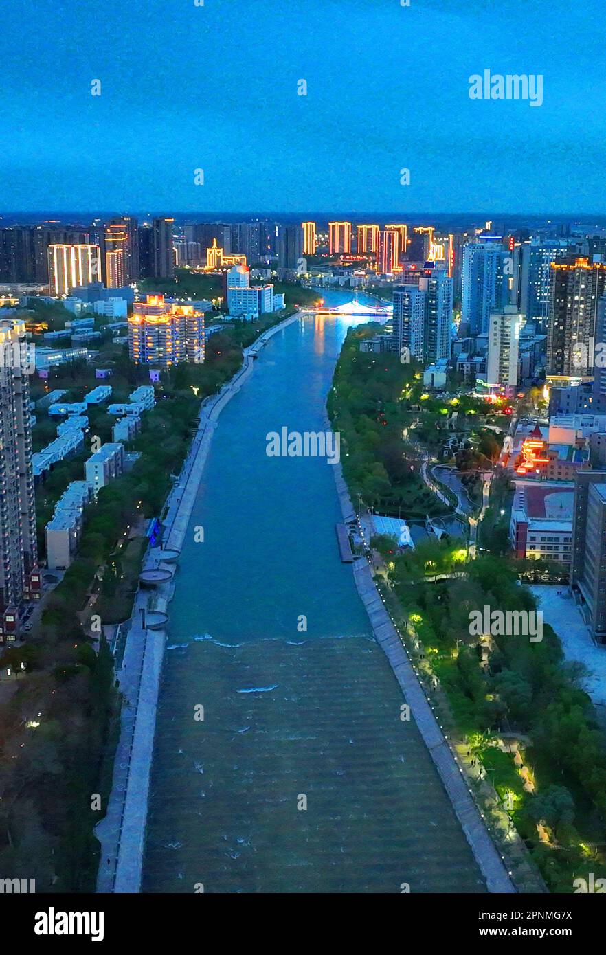 KORLA, CHINA - APRIL 19, 2023 - Night view of Korla city after rain in ...