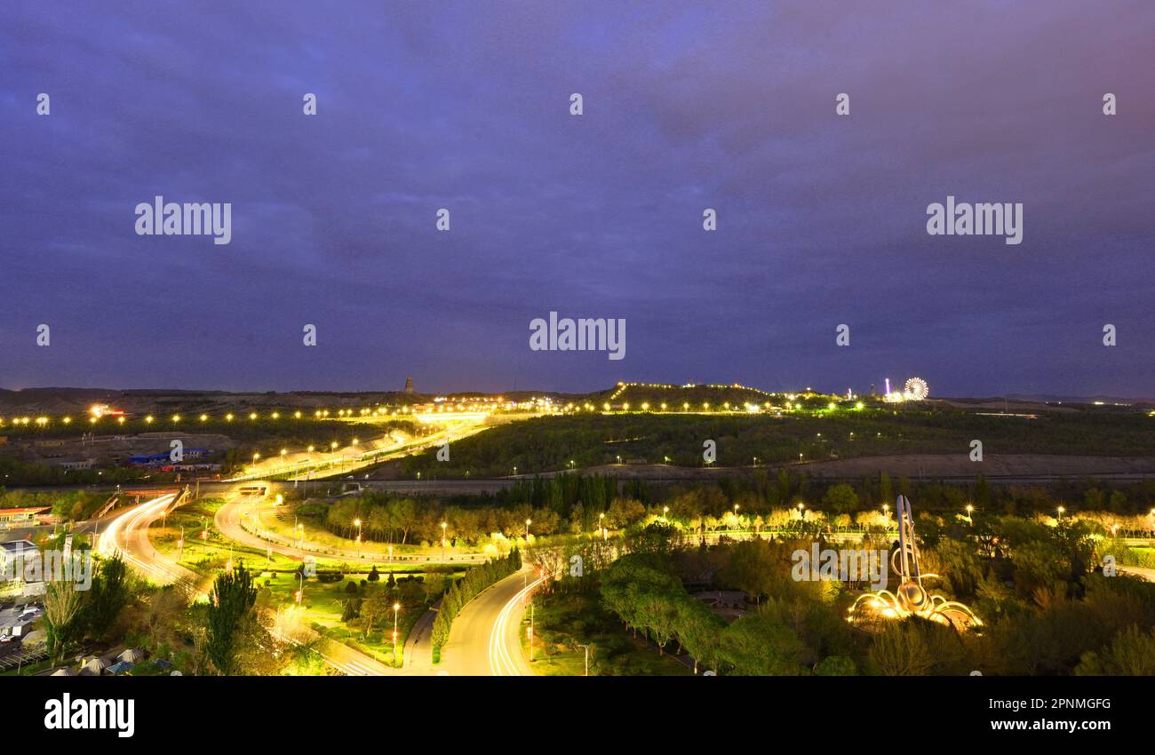 KORLA, CHINA - APRIL 19, 2023 - Night view of Korla city after rain in ...