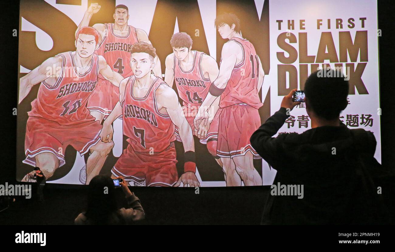 Fans take photos in the debut show of the animie movie The First Slam ...