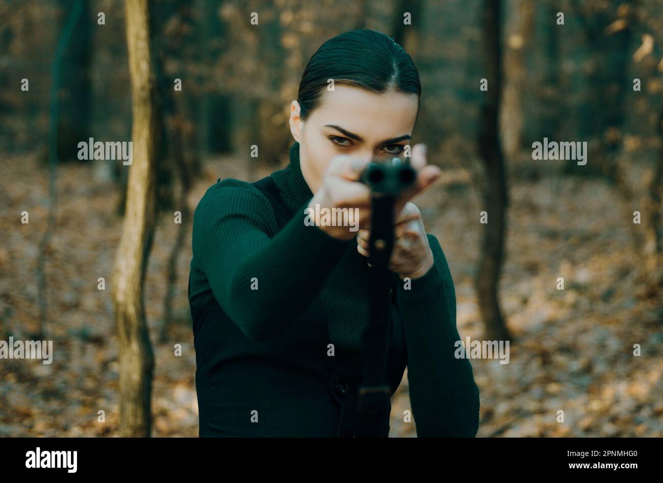 Hunting target. Target shot. female hunter in forest. woman with weapon ...