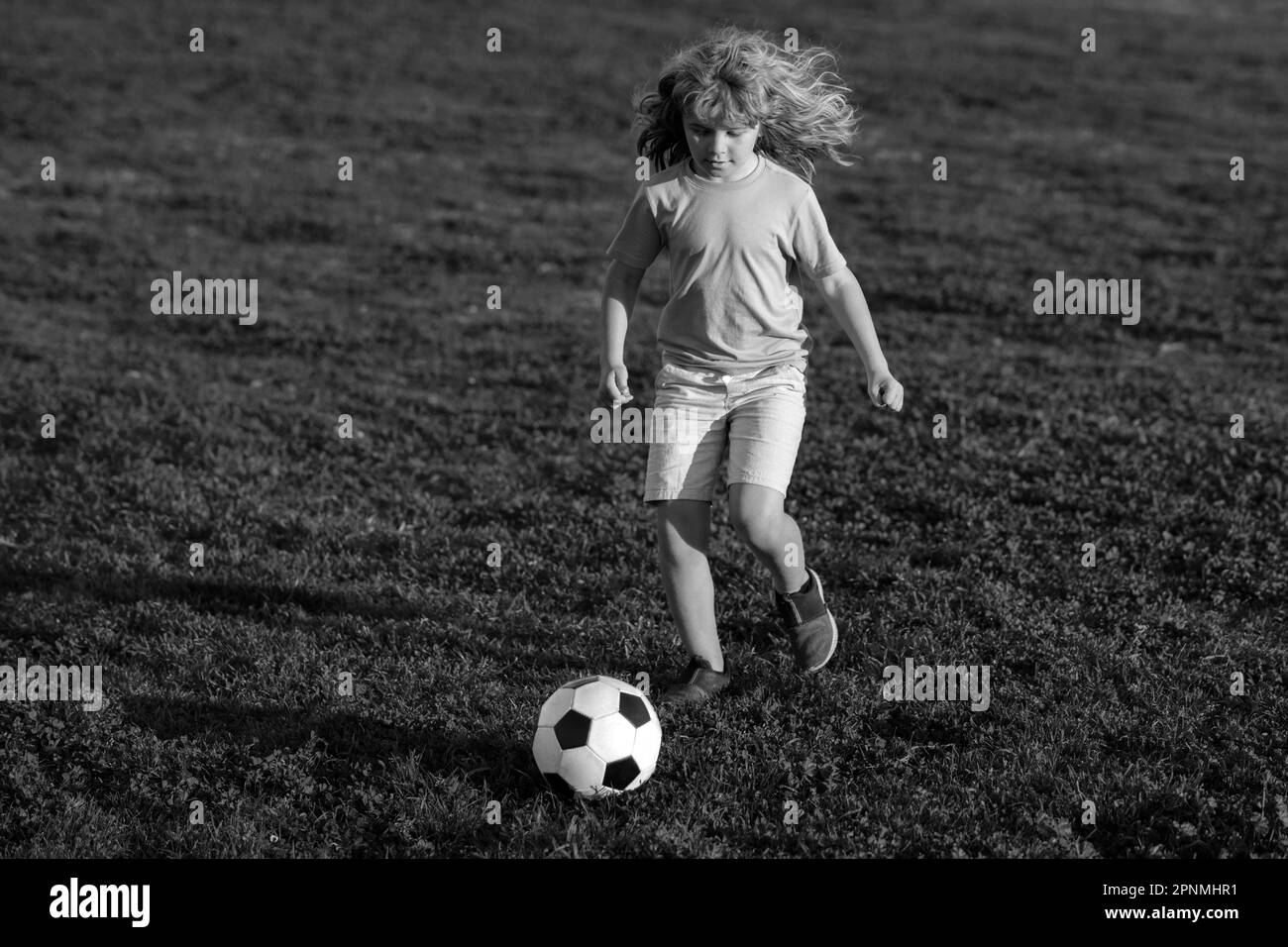 Little Black Kids Playing Football
