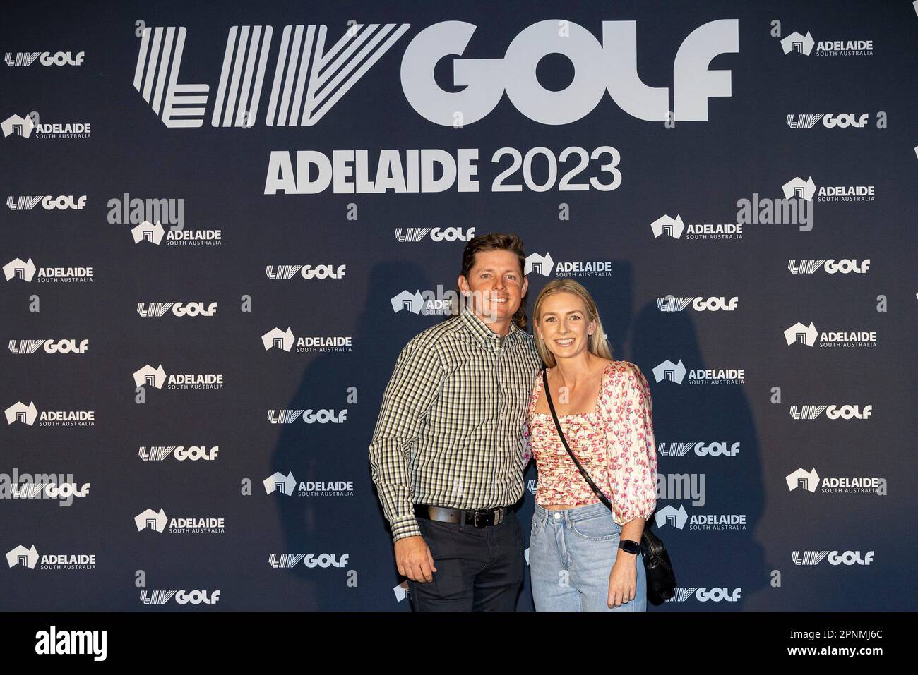 Captain Cameron Smith of Ripper GC and an attendee pose for a photo ...