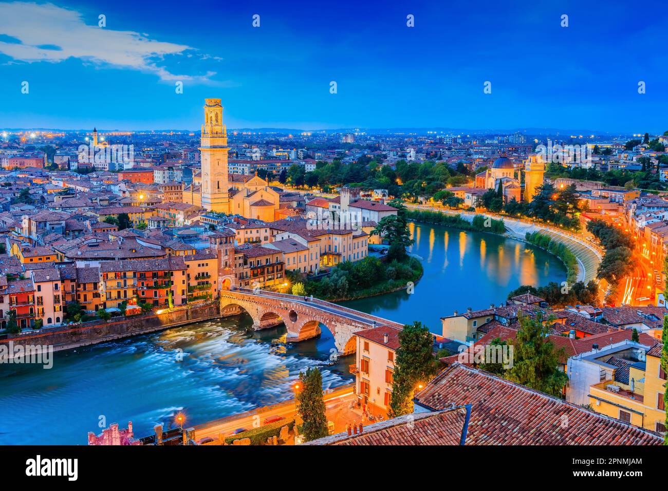 Verona, Italy. View of Verona old town and Adige river at dusk Stock ...