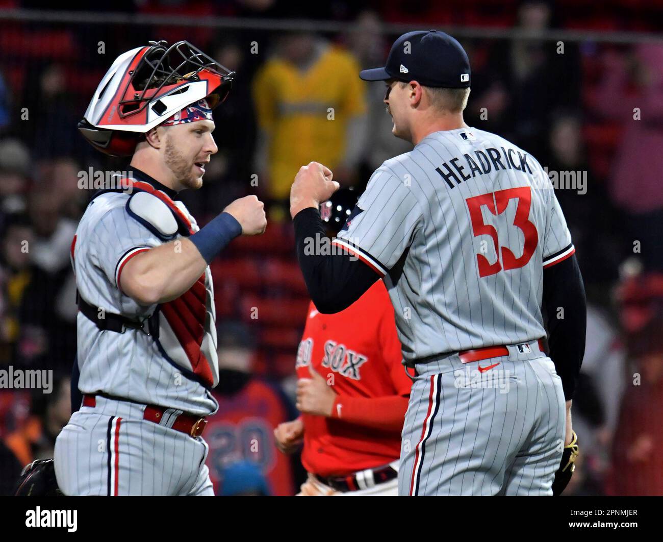 Minnesota Twins catcher Ryan Jeffers and pitcher Brent Headrick fist ...