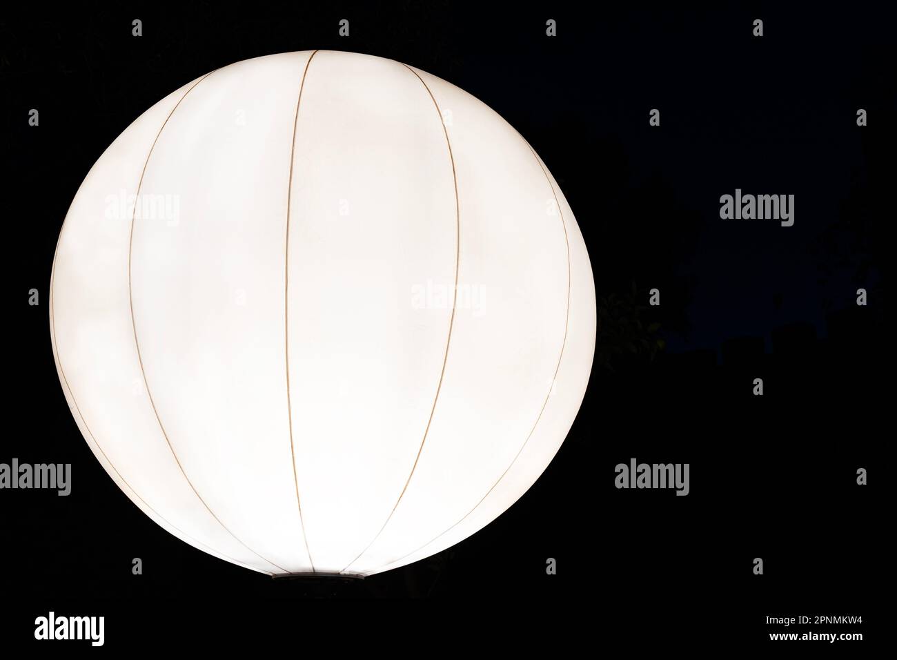 Close up of round bright light shade lighted up in the darkness Stock ...