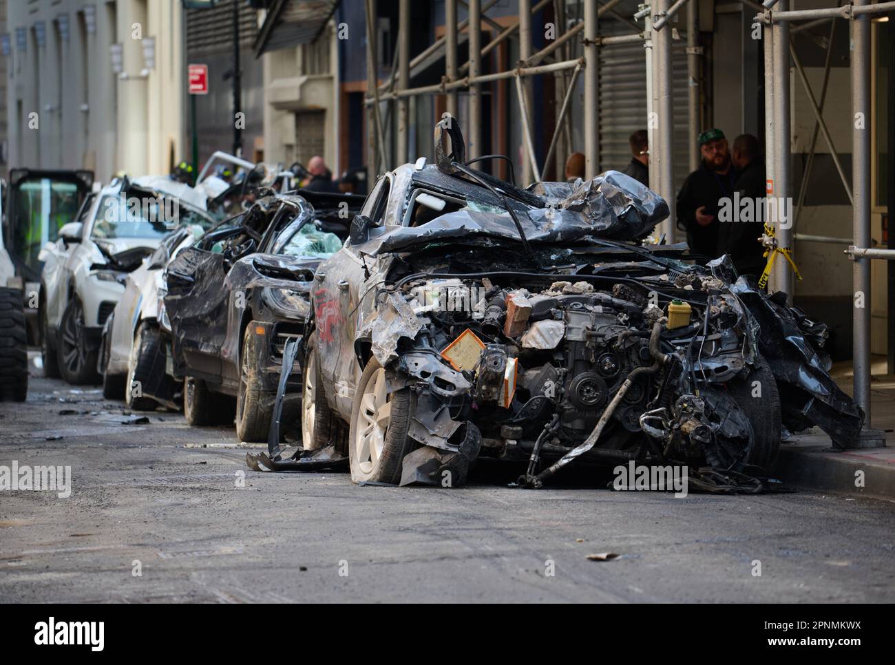 New York, New York, USA. 19th Apr, 2023. Cars crushed in a four-story ...