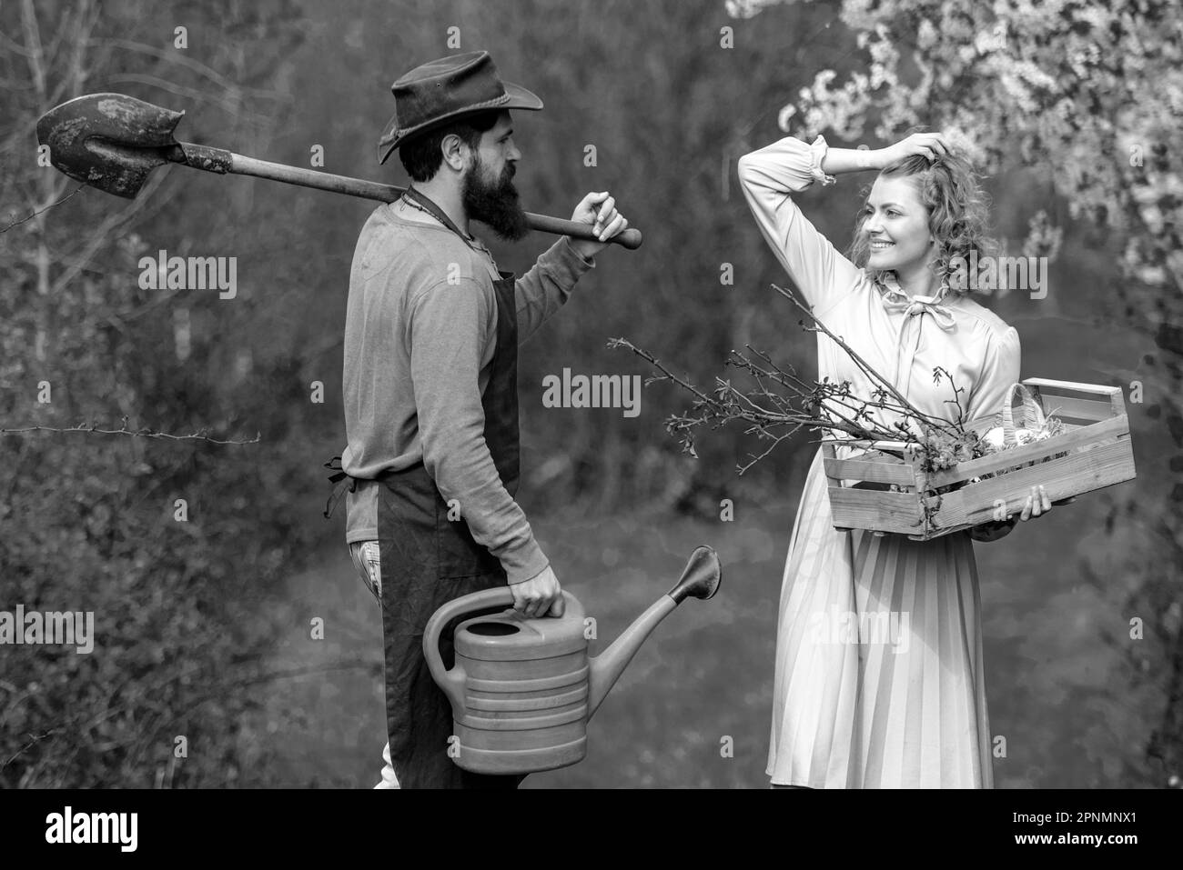 Couple Farmers. Two people walking in agricultural field. Farming ...