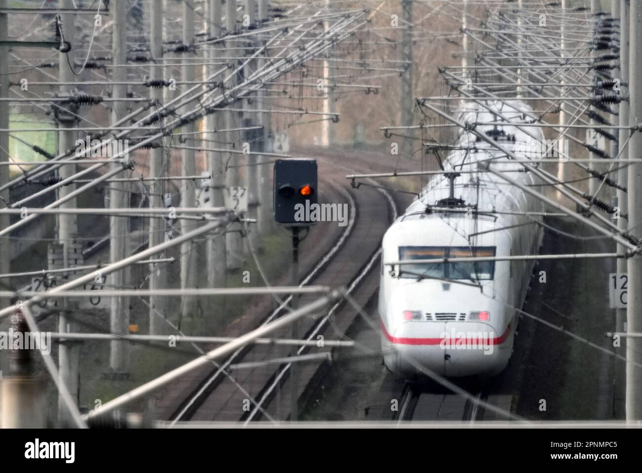 19 April 2023, Brandenburg, Wustermark/Ot Elstal: A Deutsche Bahn ICE ...