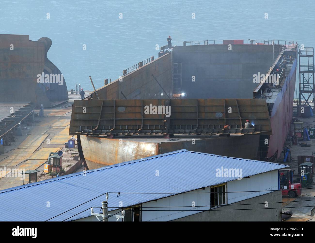 YICHANG, CHINA - APRIL 20, 2023 - Shipyard workers build ships in ...