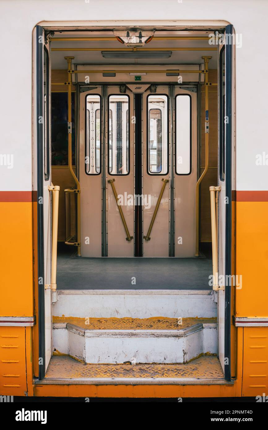 Open door of a tram with no people in Budapest. The train is ready for ...