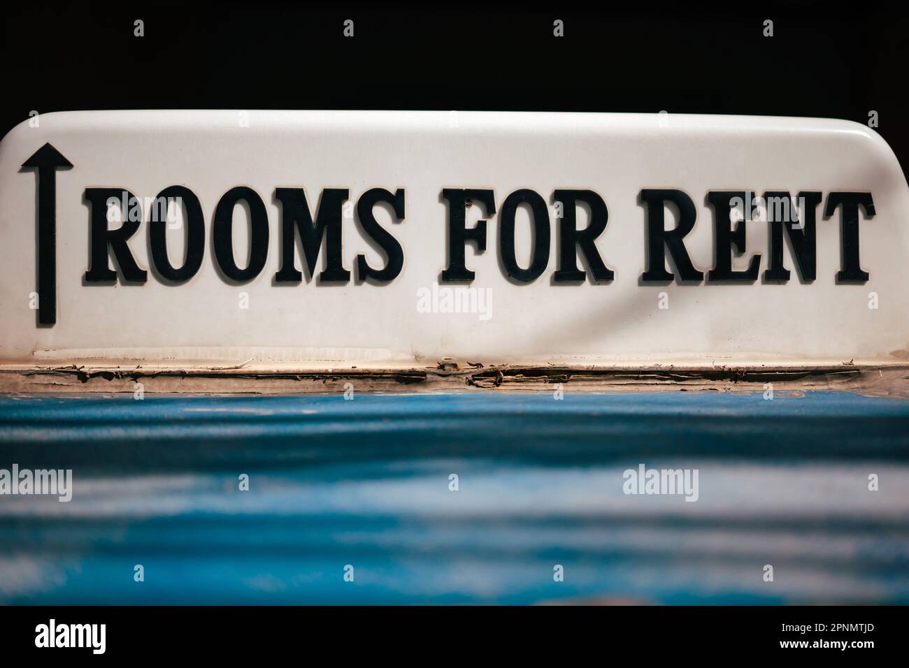 Vintage sign that says Rooms for rent and a black arrow pointing up ...