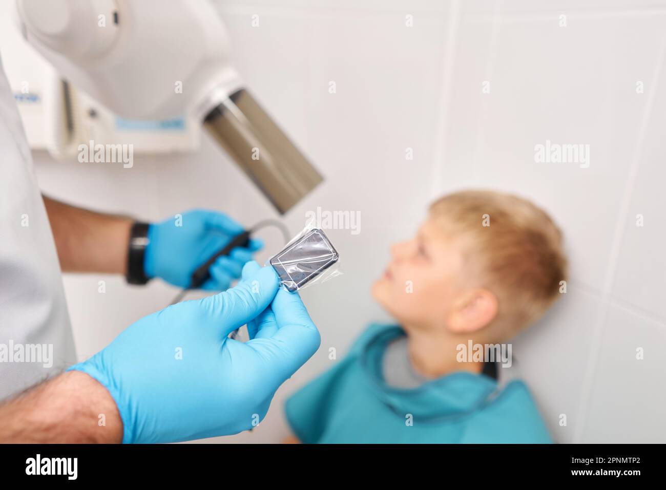 the sensor is individually packaged. close-up. Radiographer taking ...