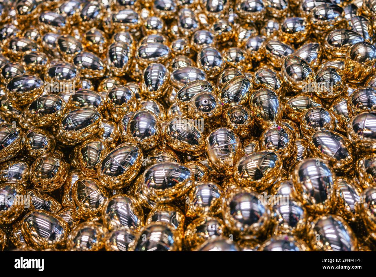 Texture of golden shiny eggs. A mountain of golden eggs in a slot ...