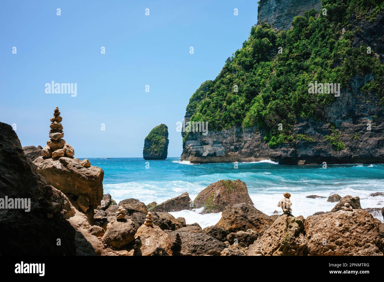 Tropical cove Tembeling Beach and Forest on Nusa Penida. Sunny day with ...