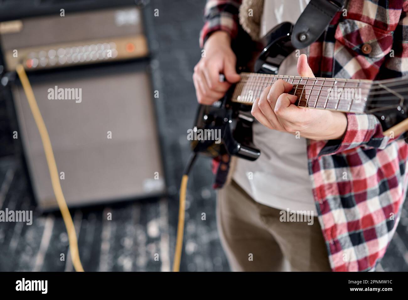 Playing guitar and concert concept. Repetition of rock music band. Man ...