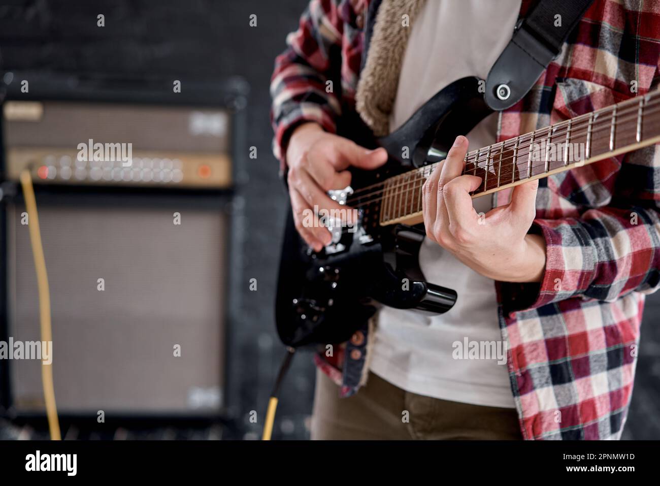 Playing guitar and concert concept. Repetition of rock music band. Man ...