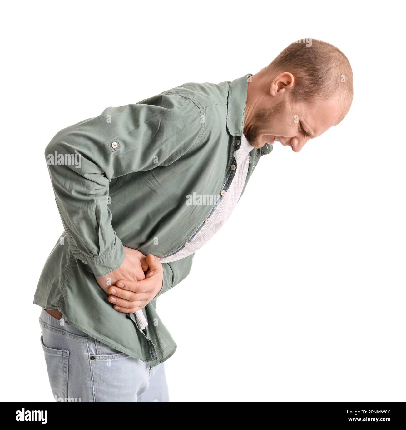 Young man with appendicitis on white background Stock Photo - Alamy