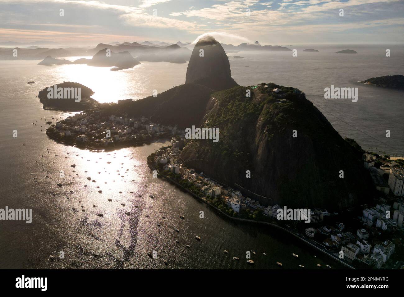 Silhouette of the Sugarloaf Mountain with Sun Rising Behind It in Rio ...