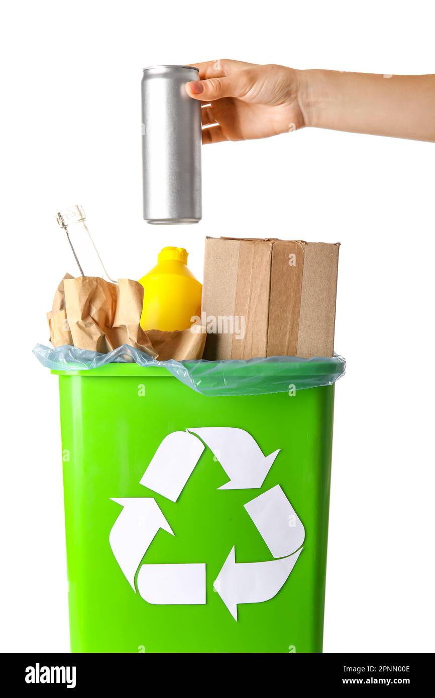 Woman throwing empty can into trash bin isolated on white background ...