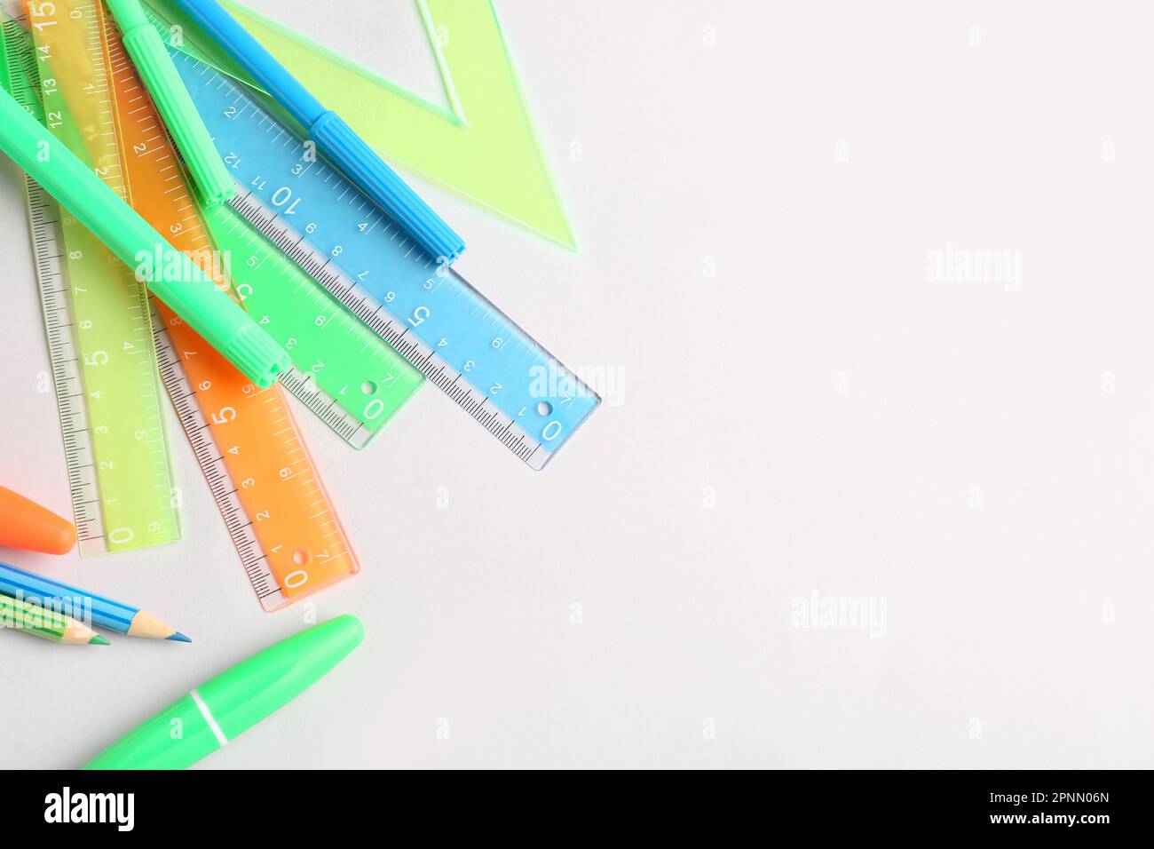 Different stationery supplies on white background Stock Photo - Alamy