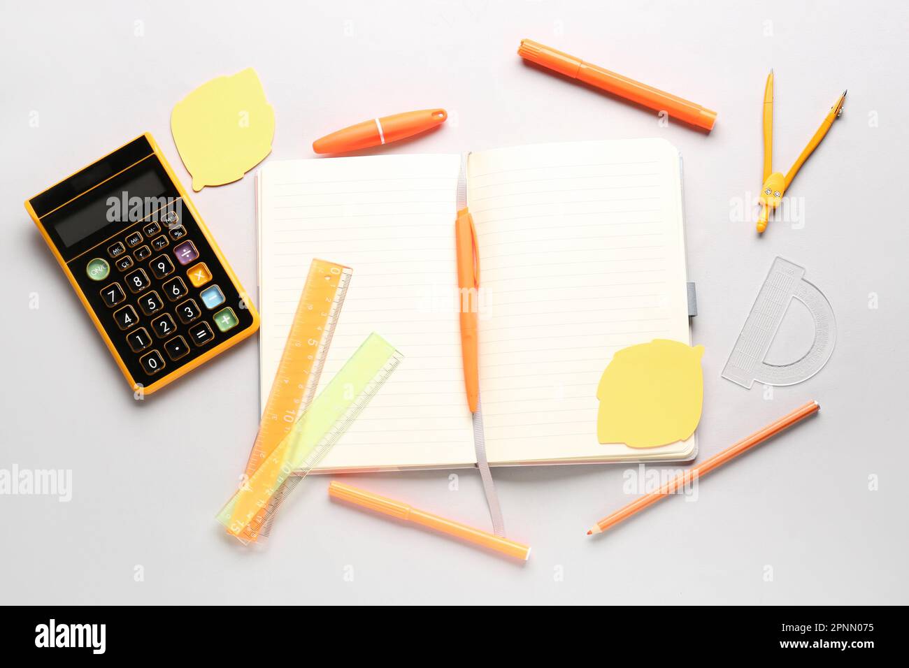 Notebook and stationery supplies on white background Stock Photo - Alamy