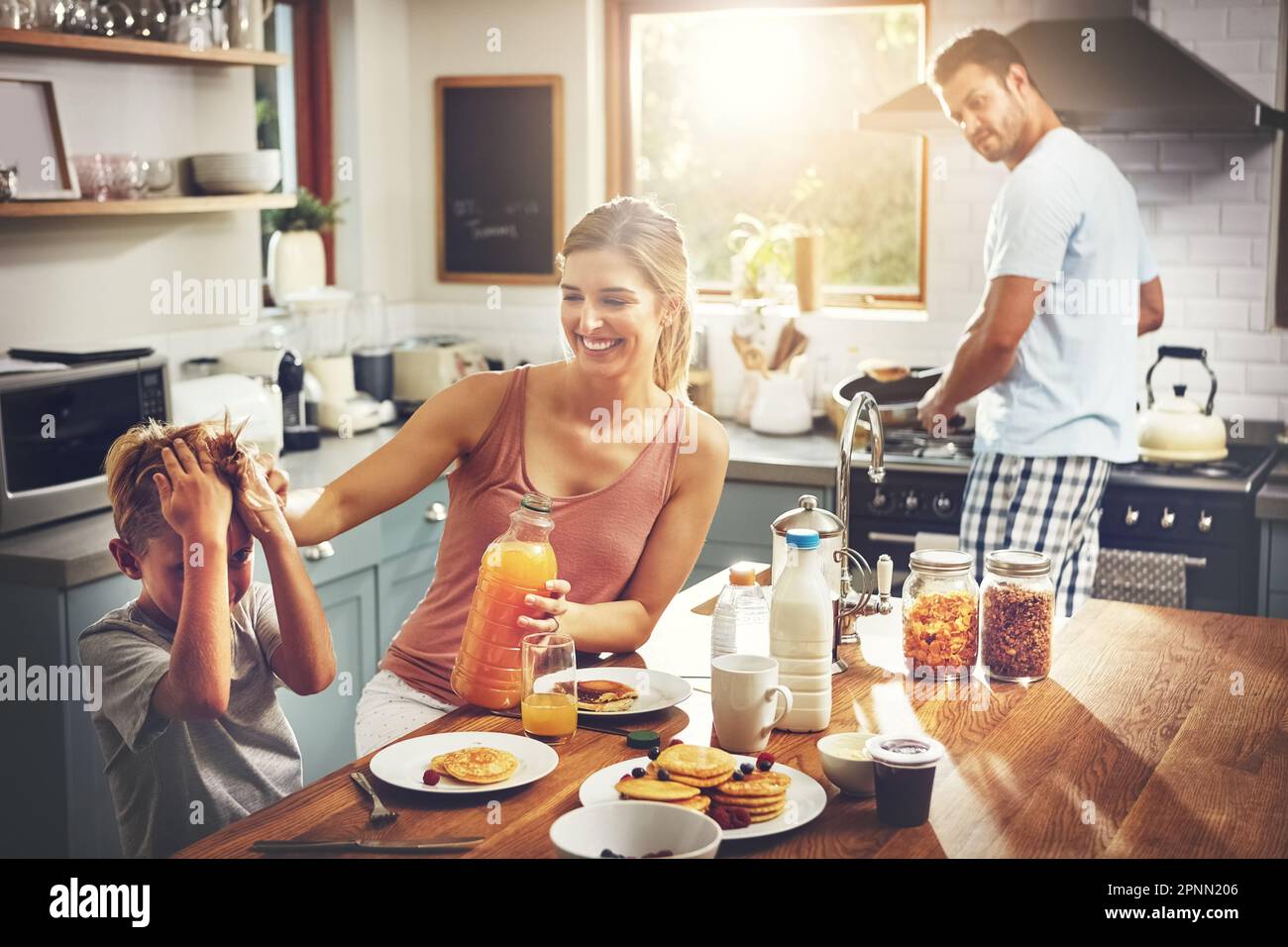 Breakfast couldnt be more fun. a little boy eating breakfast with his ...