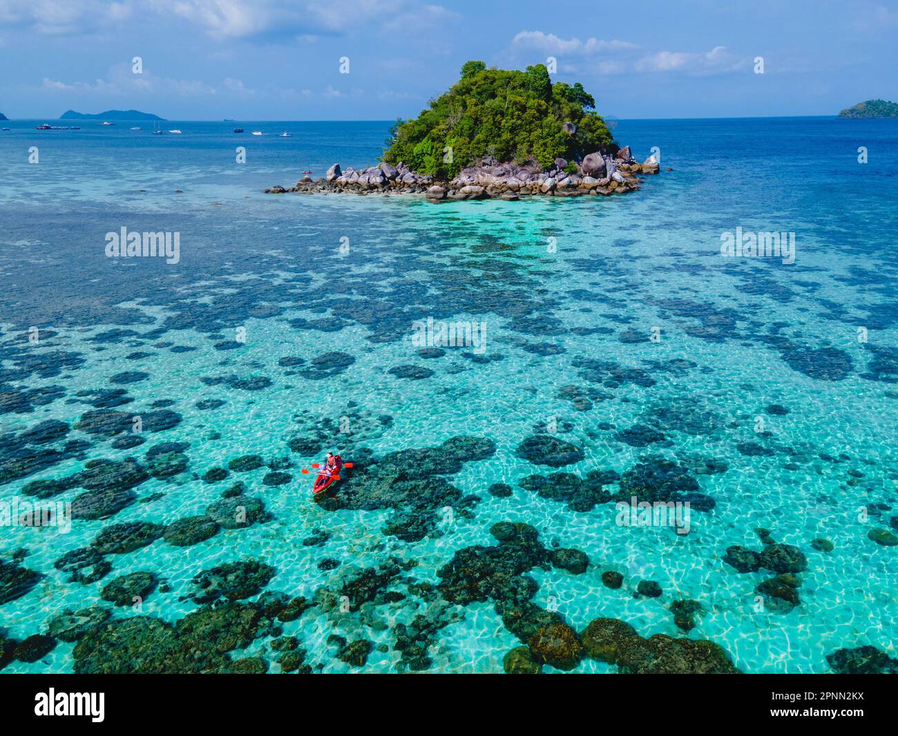 couple on the beach of Kla Island in front of Koh Lipe Island Southern ...