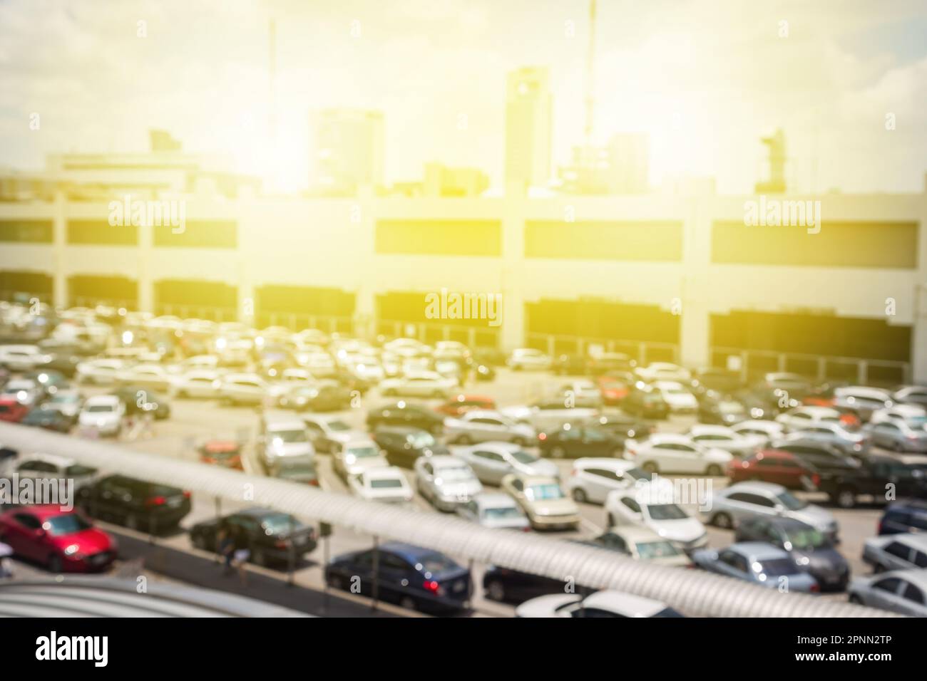 Vintage blur of car at public car parking background Stock Photo - Alamy