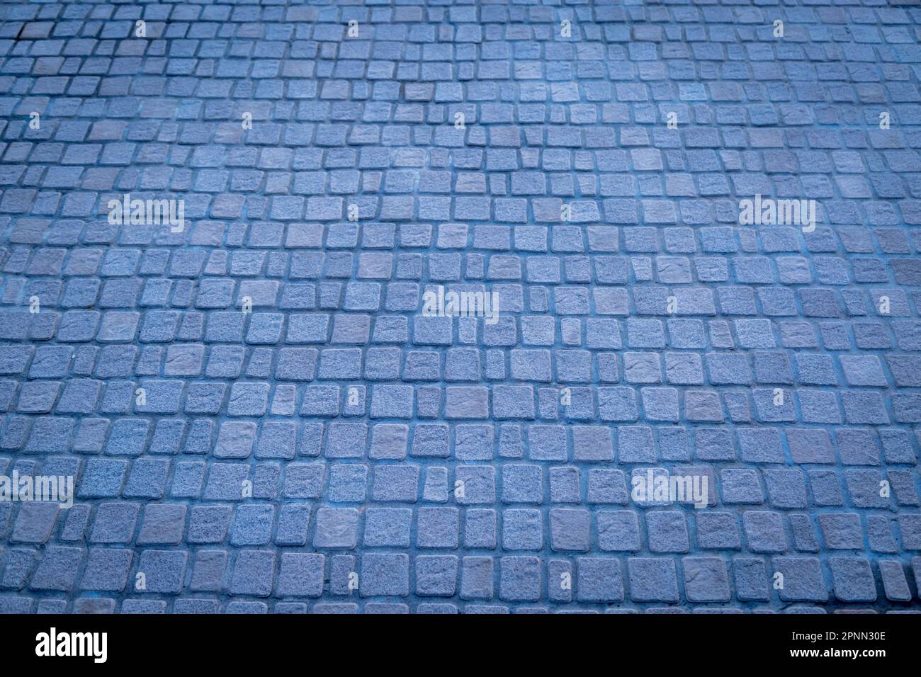 Cobblestone pavement texture background Stock Photo - Alamy