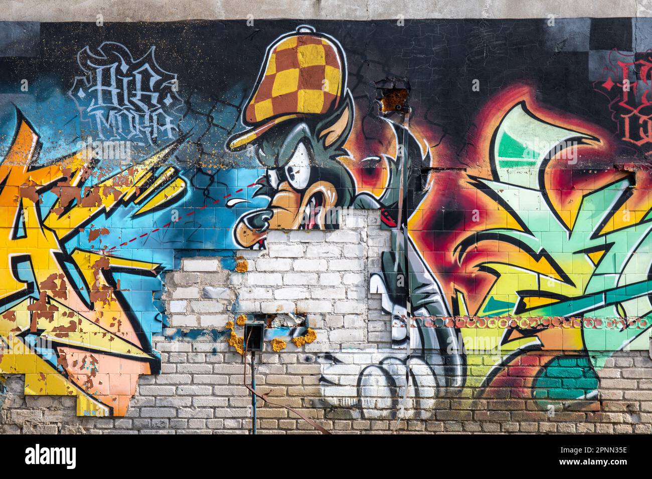 For editorial use only. Estonian street art. Partly damaged mural ...