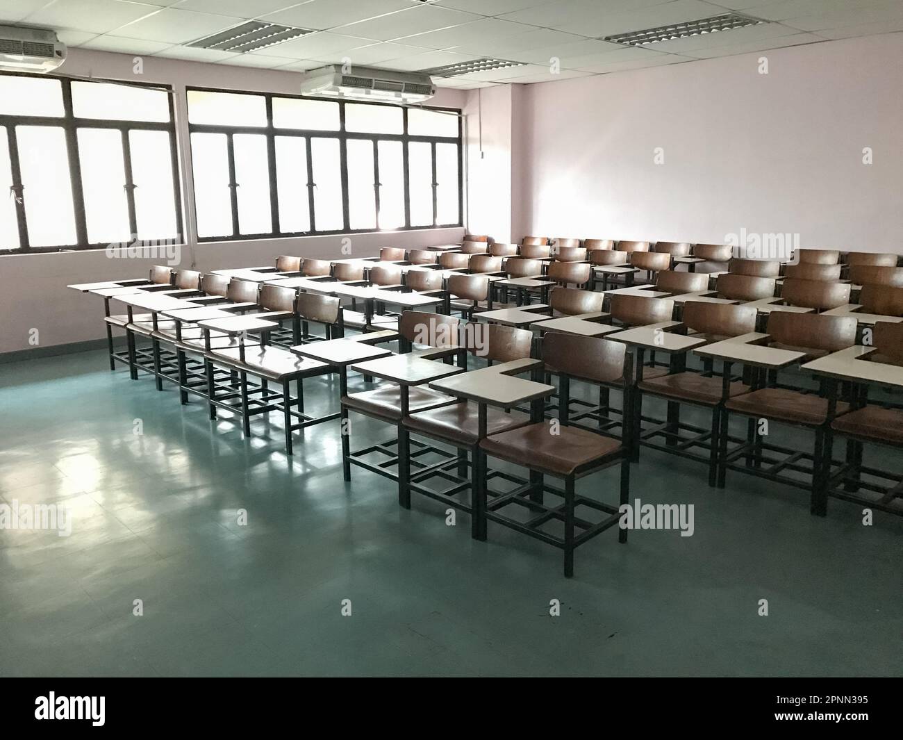 Wooden chairs in the classroom background Stock Photo - Alamy