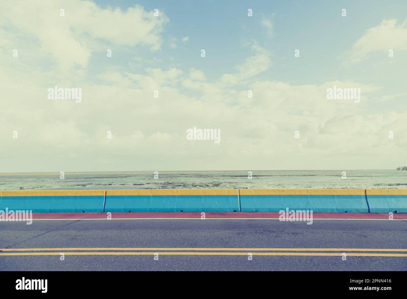 Street lane with blue sky and cloud background Stock Photo - Alamy
